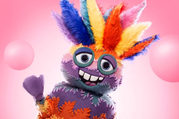 Unveiling the Masked Singer: Decoding Ugly Sweater Clues and Identity