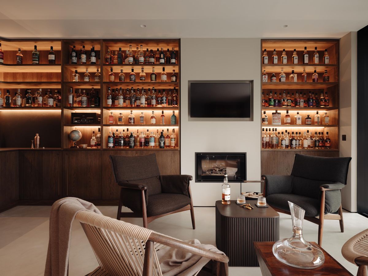 Cairn House | Custom Whisky Room, Pivot Door + Furniture | Angus+Mack