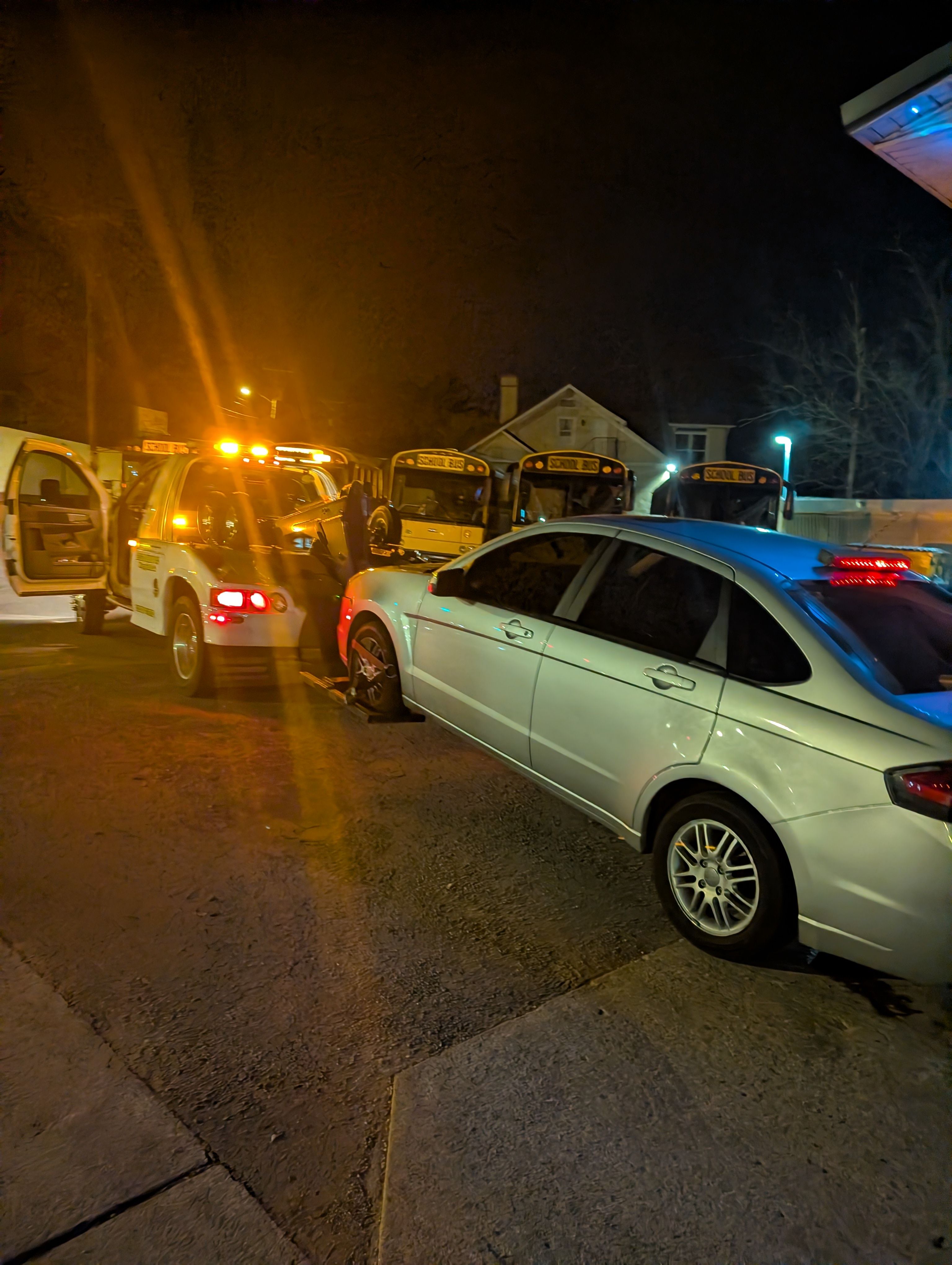 Nighttime Towing Solution for a Stuck Ford Focus | ABC Towing & Repair, LLC