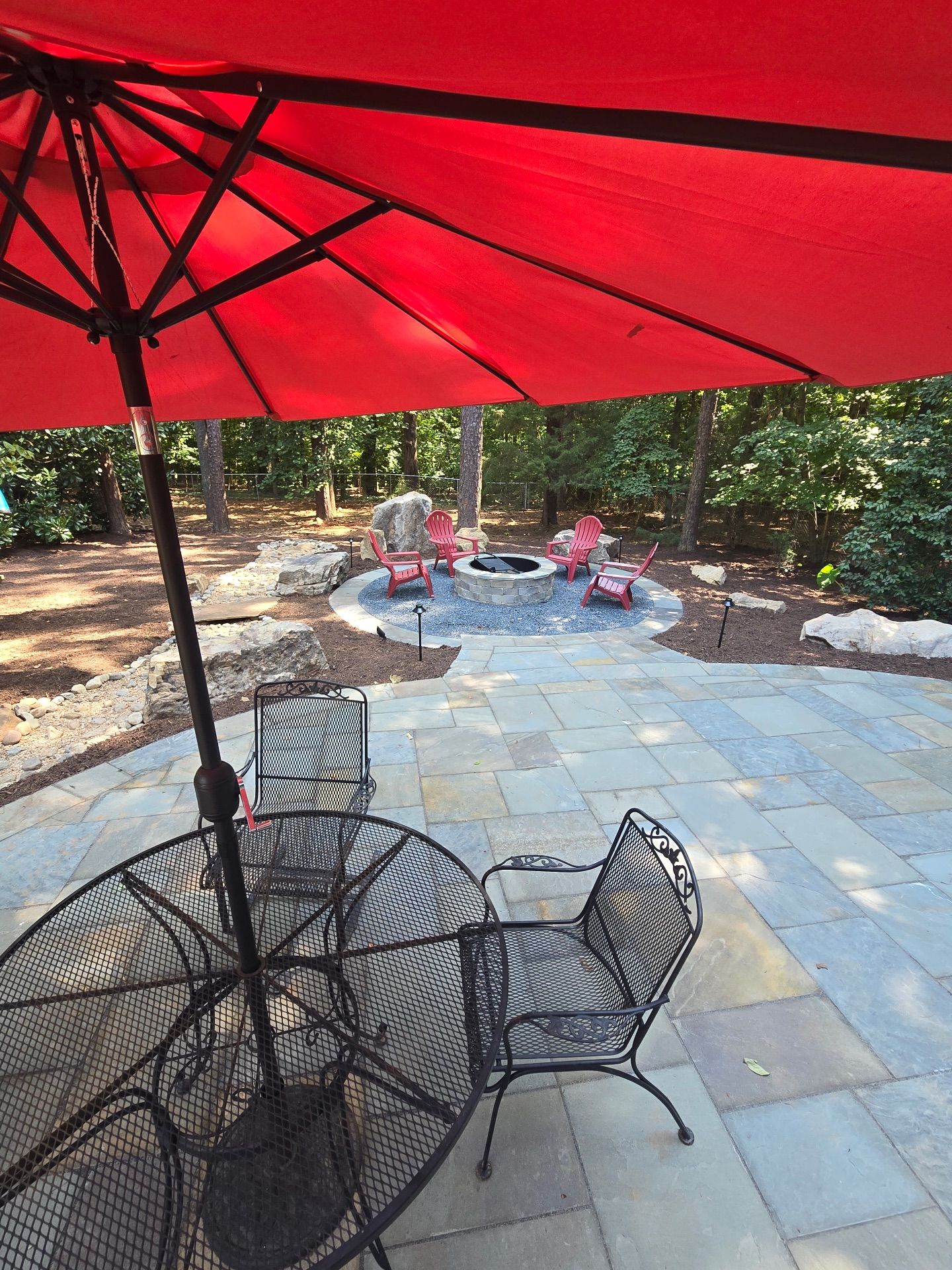 Stunning Bluestone Patio with Fire Pit Design | Earth Artisans