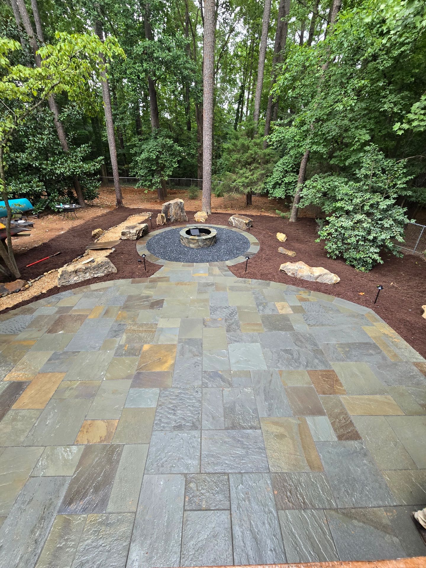 Stunning Bluestone Patio with Fire Pit Design | Earth Artisans