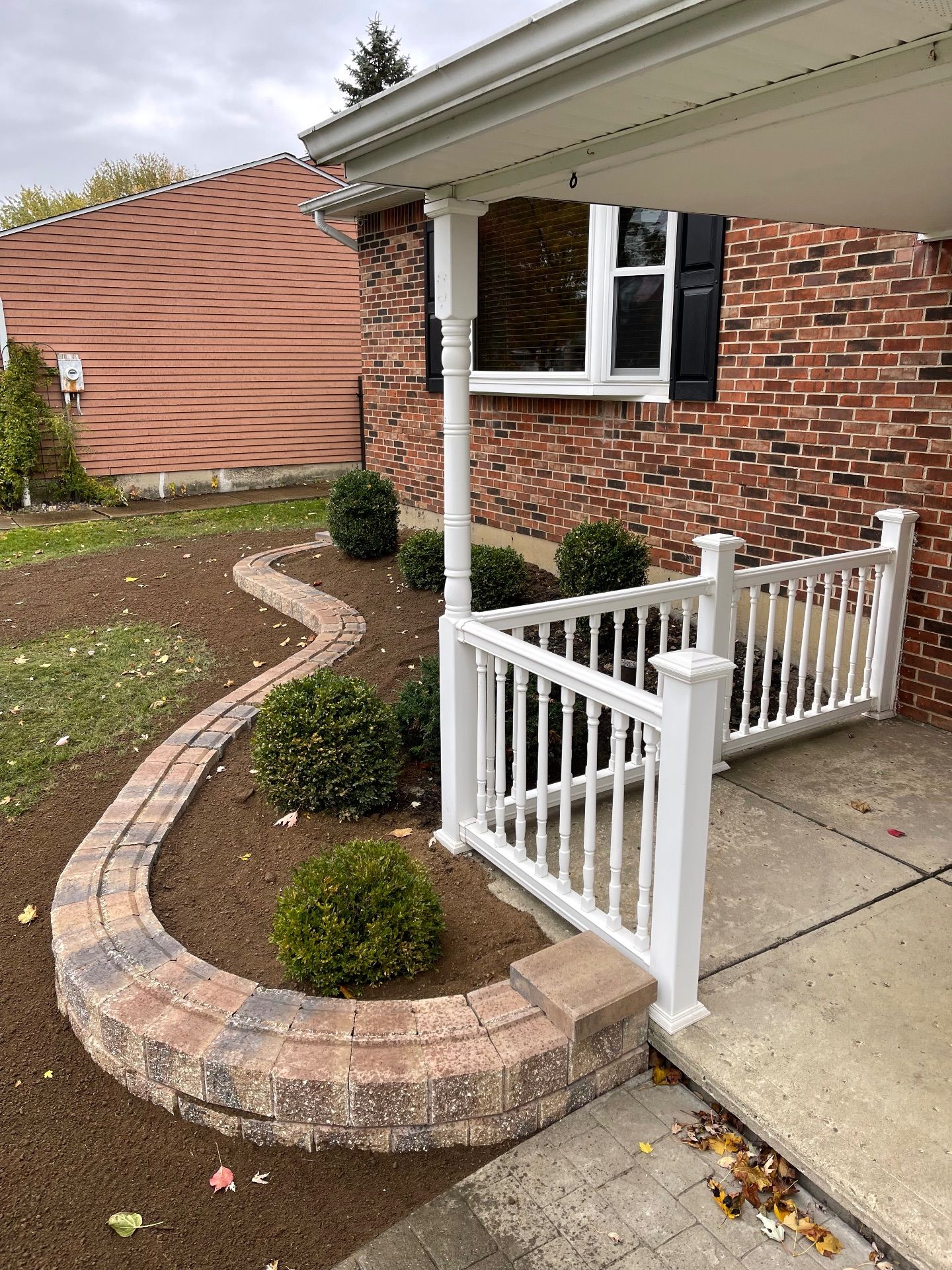 Elegant Retaining Wall and Landscaping with Unilock Pisa Blocks ...