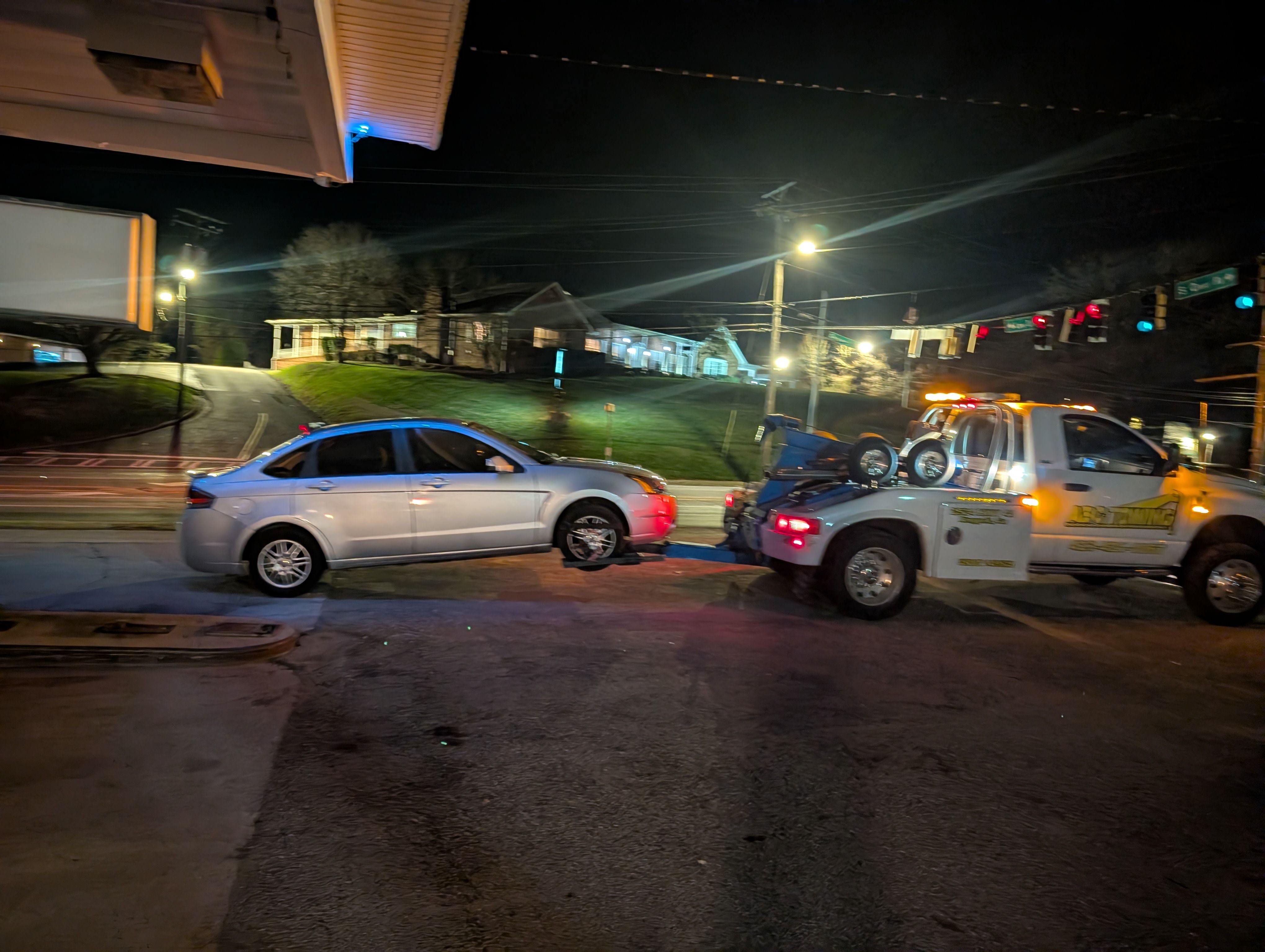 Nighttime Towing Solution for a Stuck Ford Focus | ABC Towing & Repair, LLC