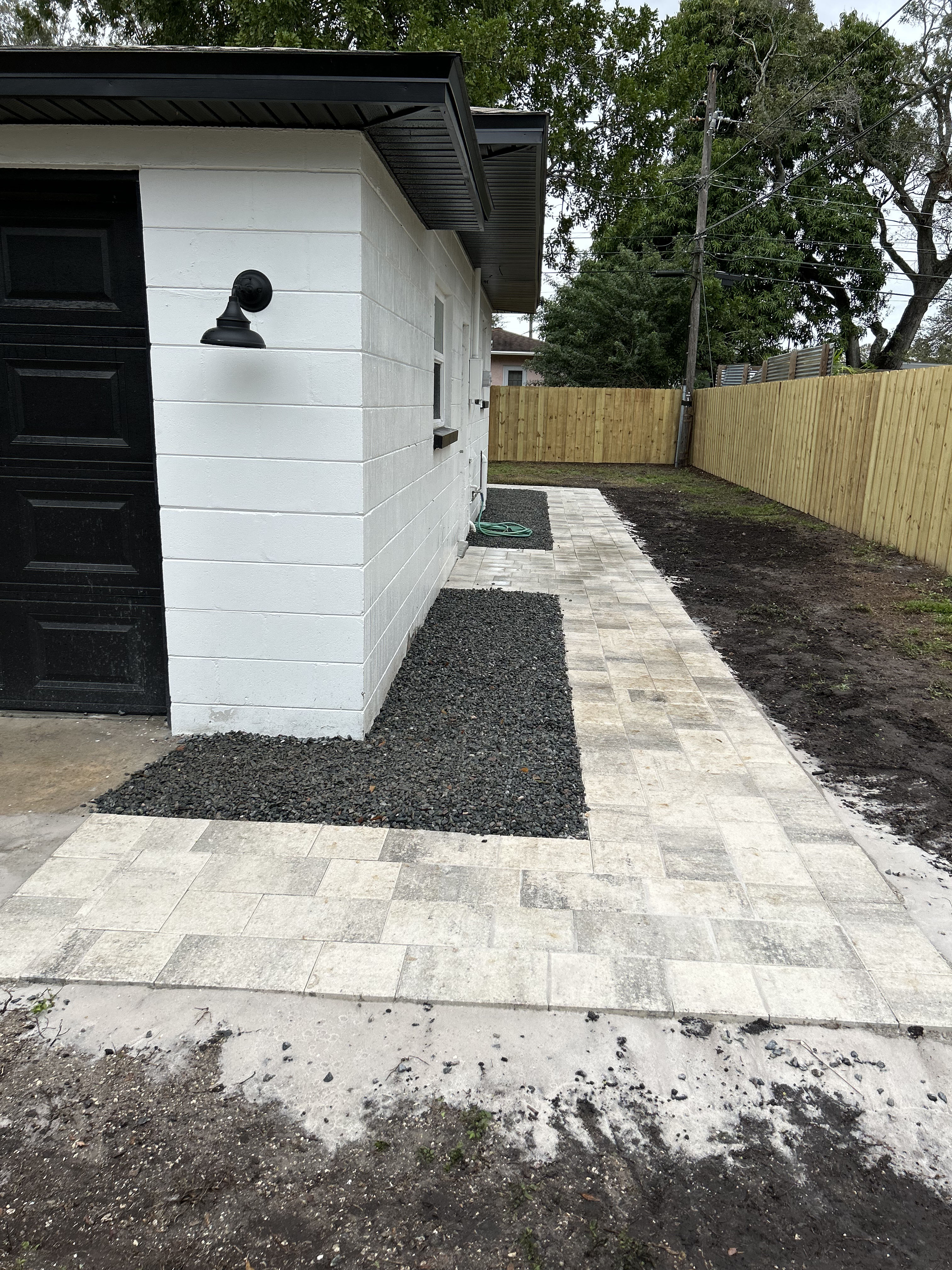 New Paver Pathway and Wood Fence Installation | Golden Landscape & Tree ...