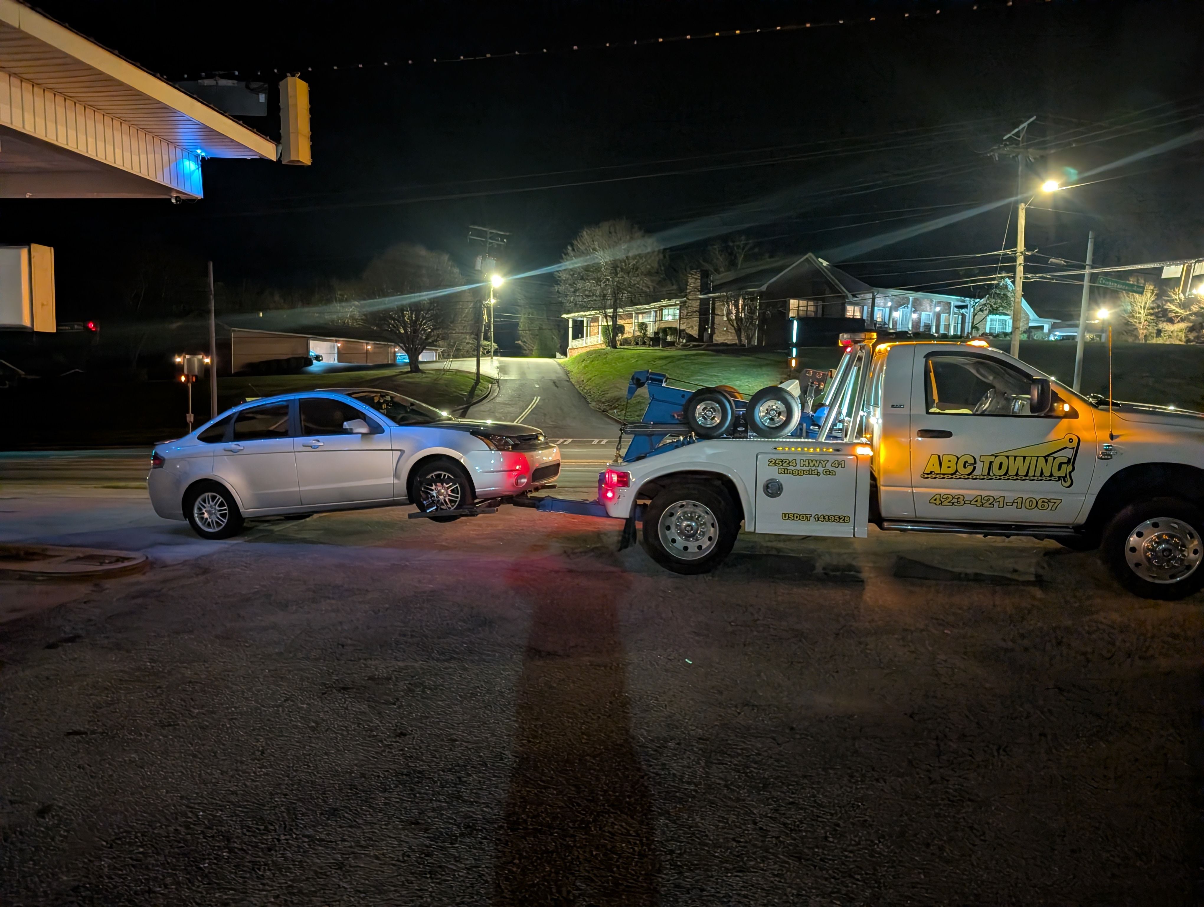 Nighttime Towing Solution for a Stuck Ford Focus | ABC Towing & Repair, LLC
