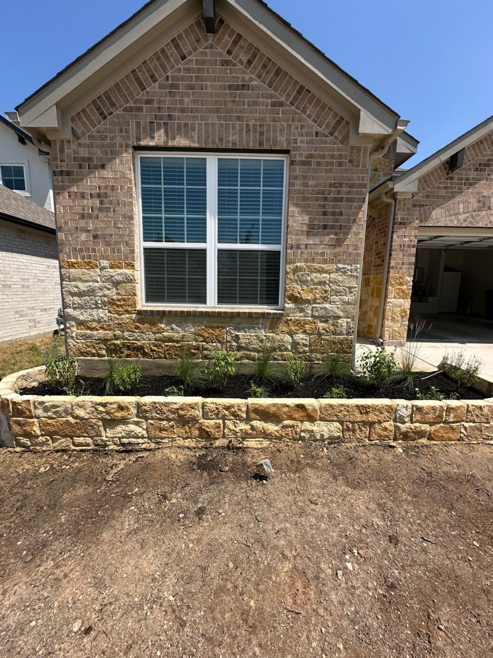 Custom Limestone Planter Bed in Leander | Straight Edge Landscaping