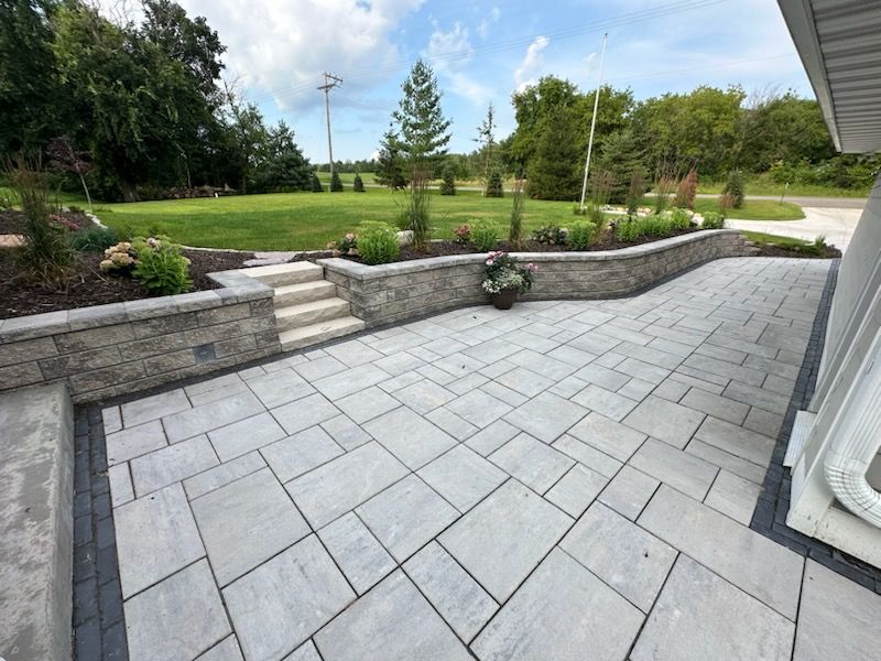 Mastering Outdoor Transformations with Elegant Retaining Walls ...