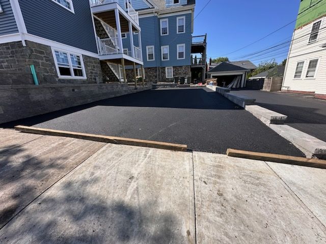 Masonry and Asphalt Driveway Upgrade | EAC Masonry and Landscaping Inc.