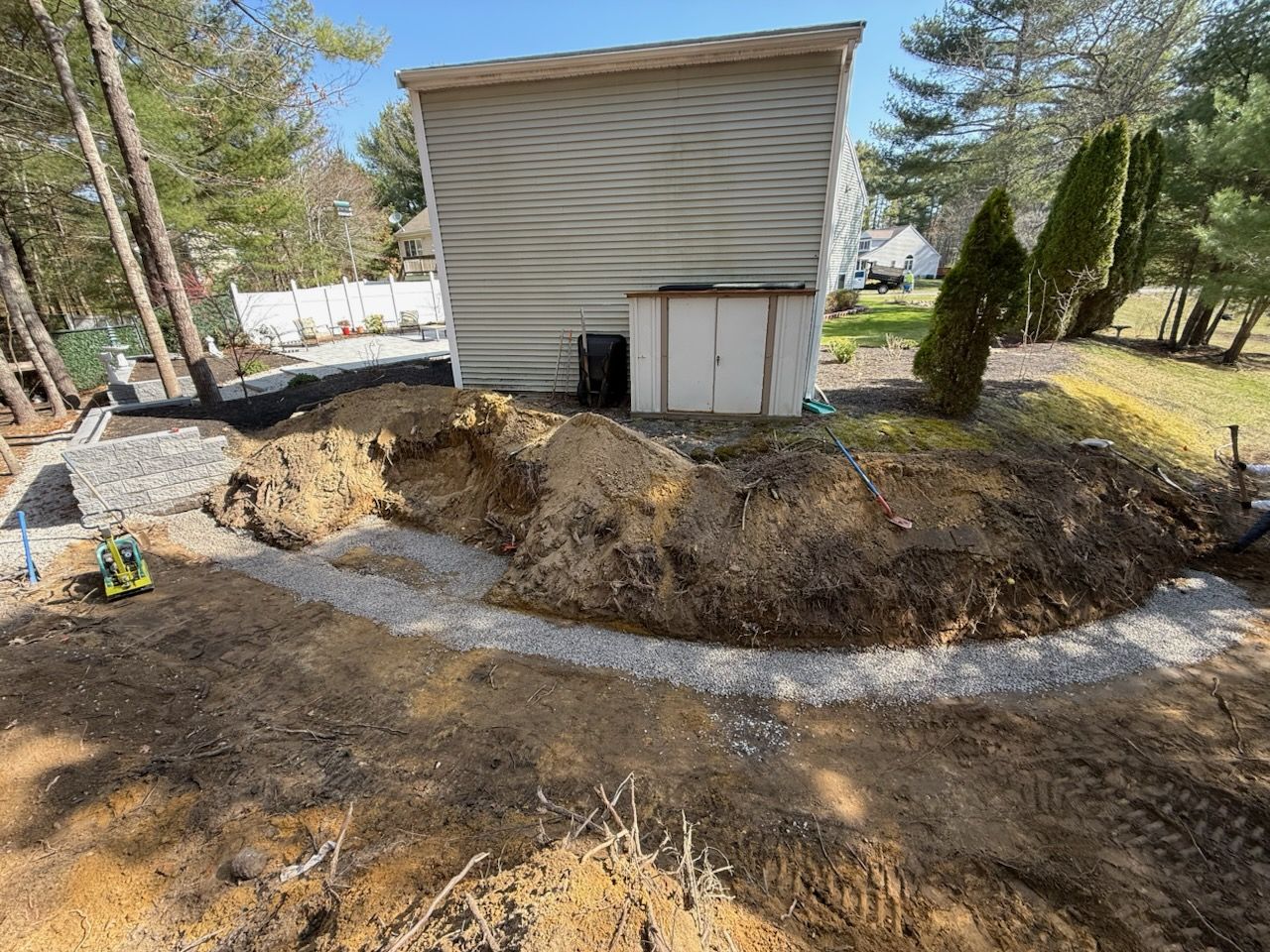 Building the Foundation for a Retaining Wall | Dmo Scapes, LLC