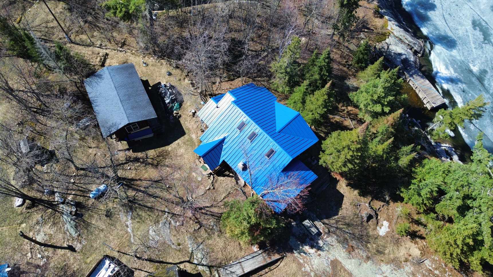 Stunning Royal Blue Roof on Lake Kabetogema Cabin | Iron Ridge ...