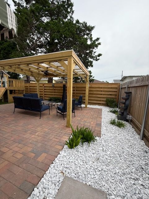 Charming Patio with Wooden Pergola in River Ridge | Modern Construction ...