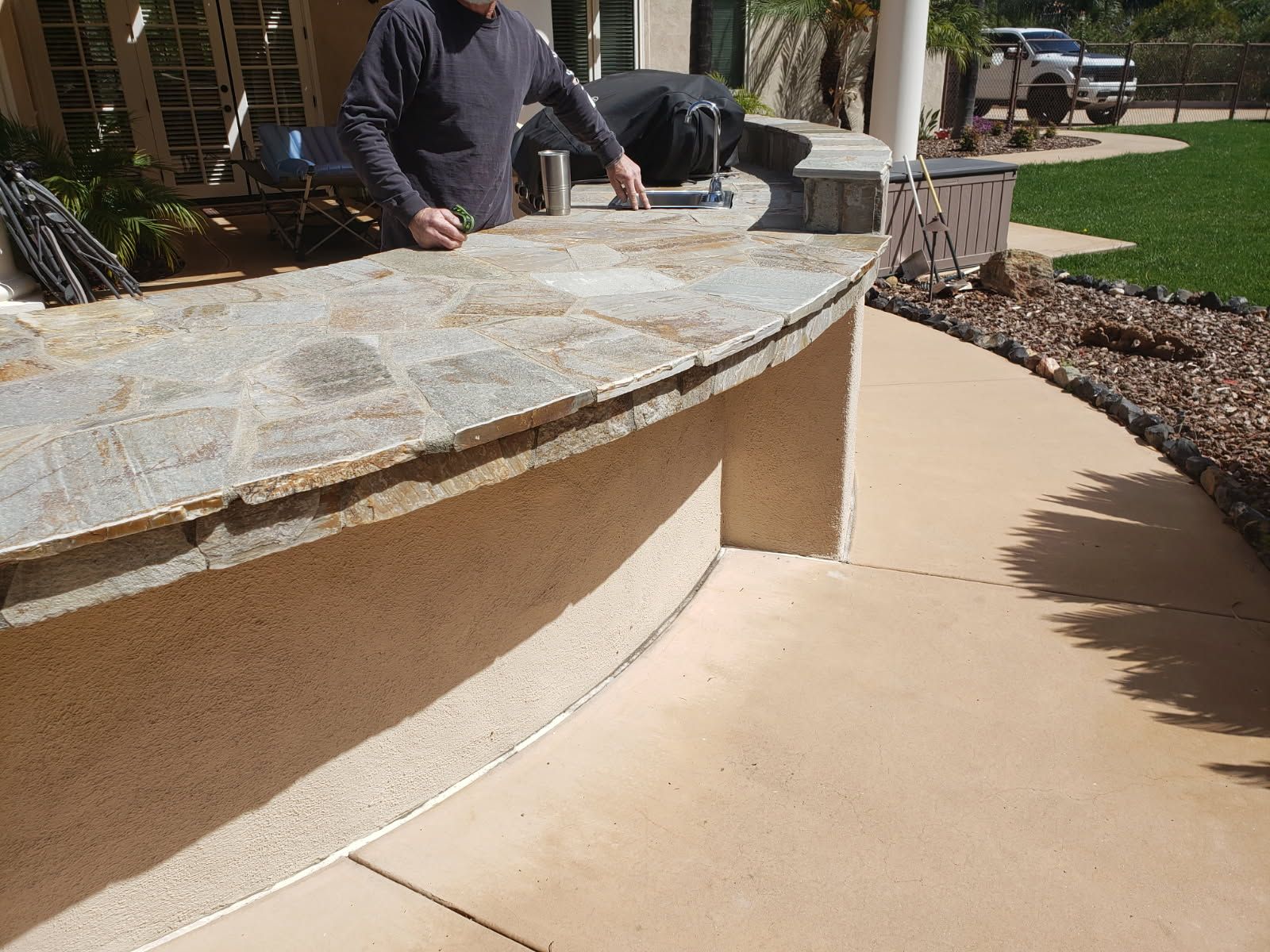 Beautiful Flagstone Outdoor Kitchen Installation | Renewabuilt Inc