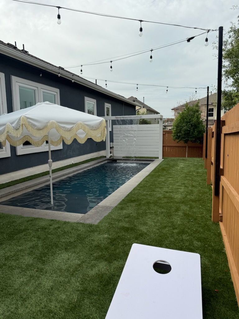 Backyard Oasis with Artificial Turf and Lighting | Champion Outdoor ...