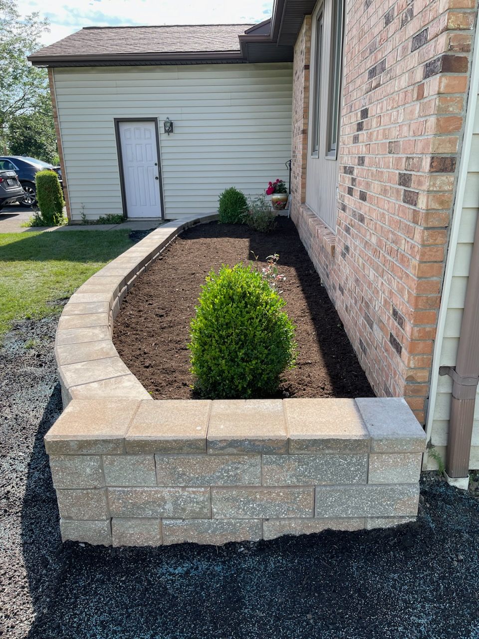 Stylish UniLock Pisa XL Retaining Wall Installation | Signature Land ...