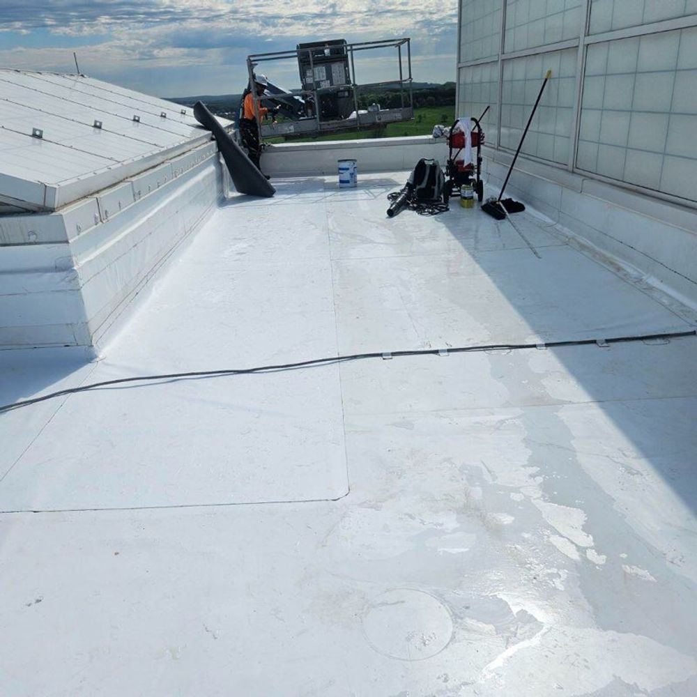 Flat Roof Installation Services - Sugar Maple Roofing LLC
