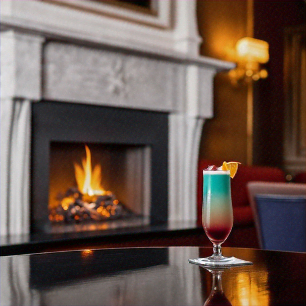 Frosty Fireside Flare, Invigorating winter cocktail with bourbon, mint, cranberry, and citrus.