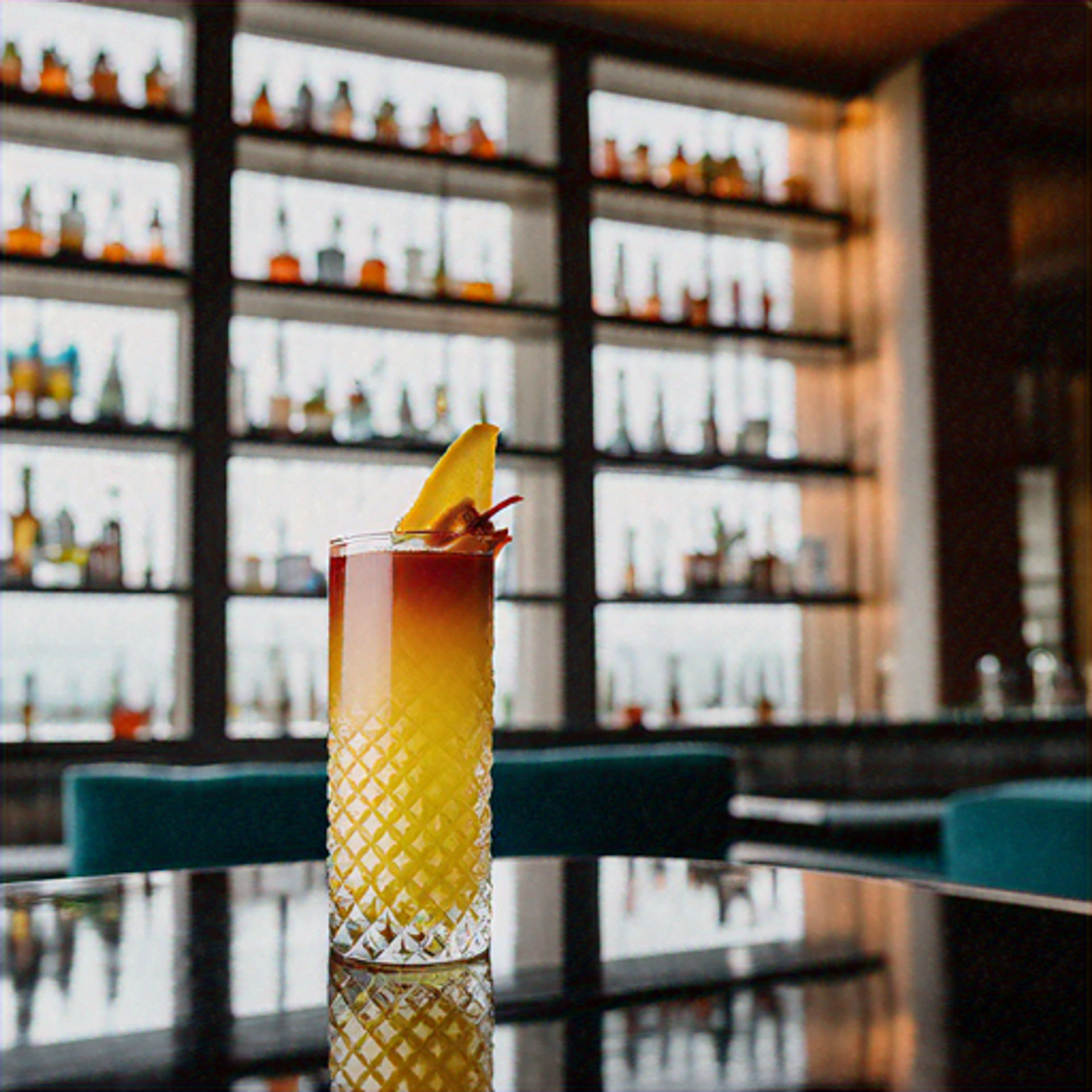 Mango Mezcal Inferno, Fiery mango mezcal cocktail with lime and ...