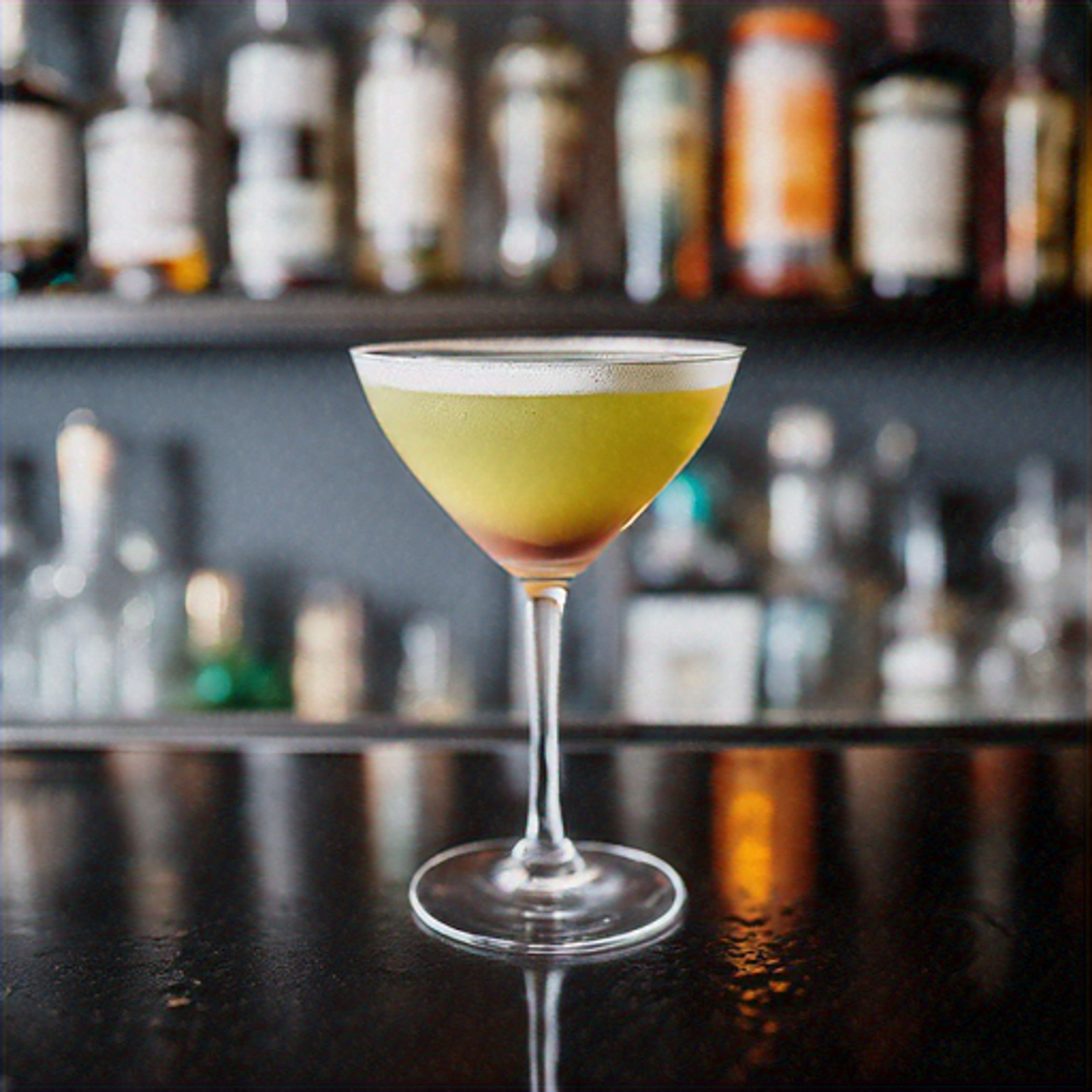 Samurai's Embrace, Gin, sake, olive brine, egg yolk cocktail