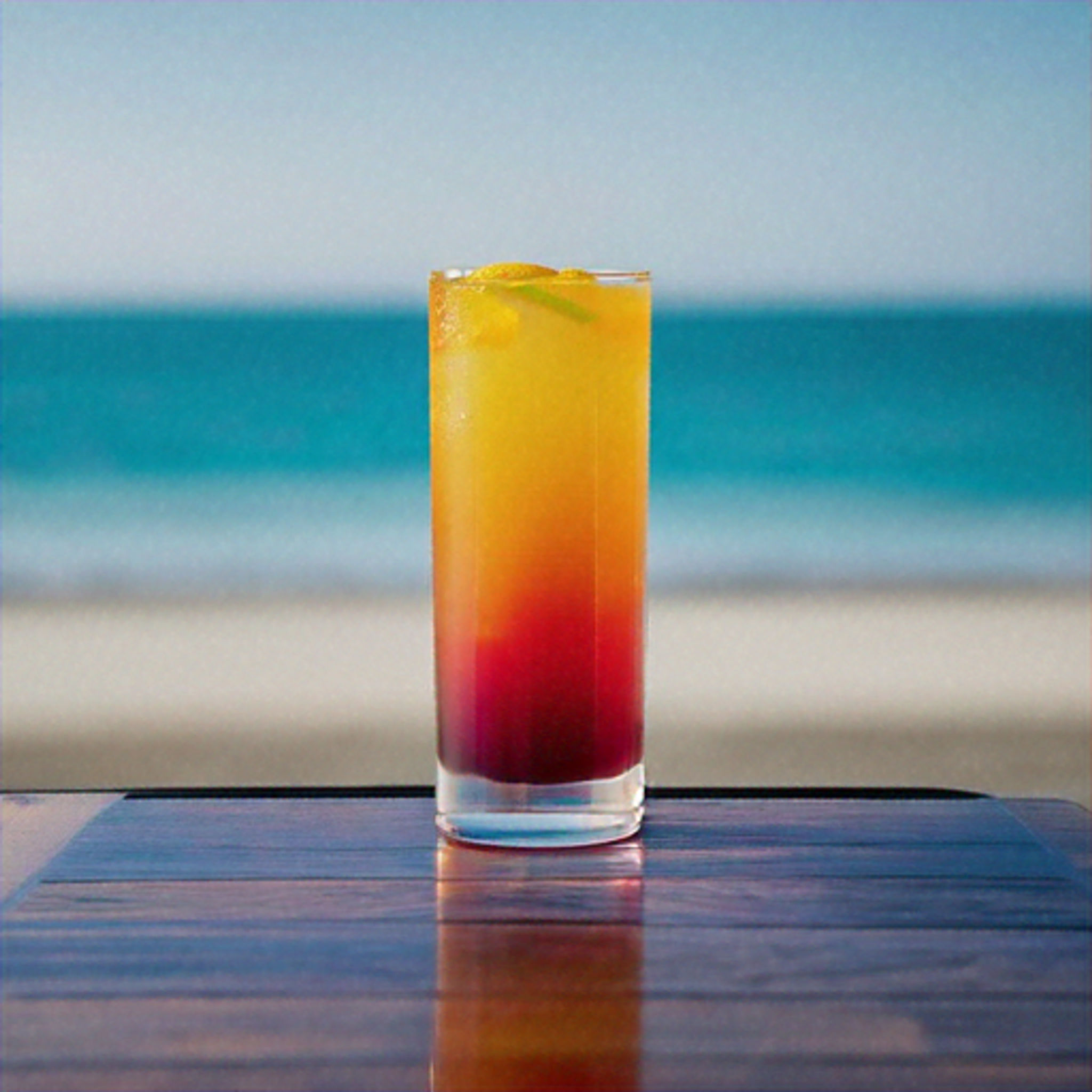 Sunset Fusion, Vibrant cocktail with vodka, orange juice, and modern twist