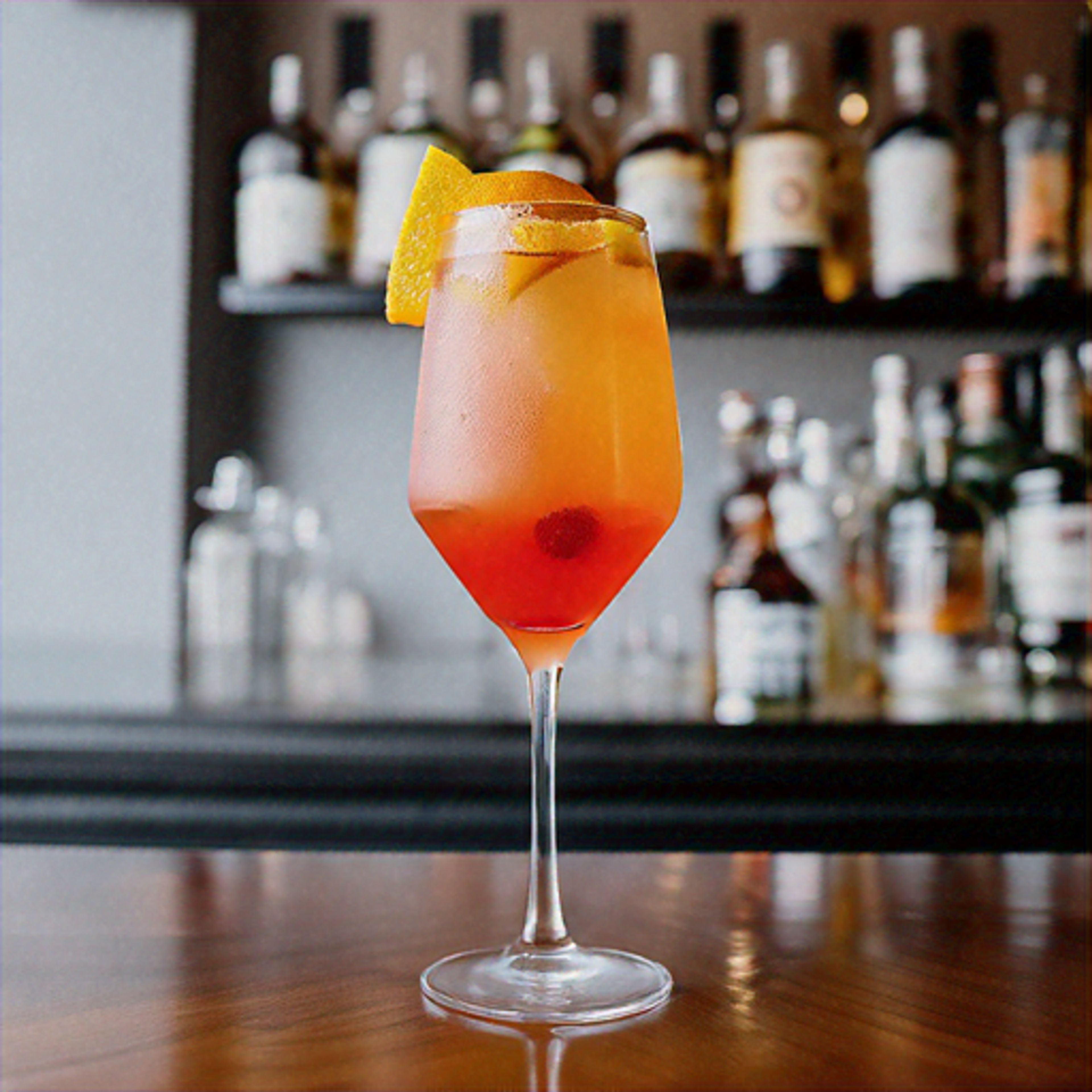 Sunset Spritz, Refreshing tropical cocktail with fruity and herbal notes
