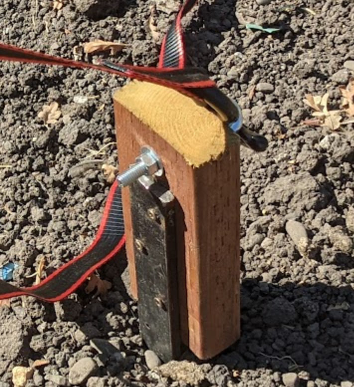 Straighten a Fence Post Using a Ratchet Strap - Abdullah Yahya