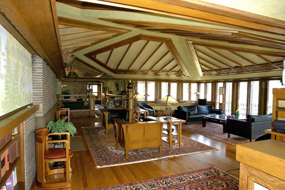 Second Floor Living Room Features An Open Layout With Two Designated ...