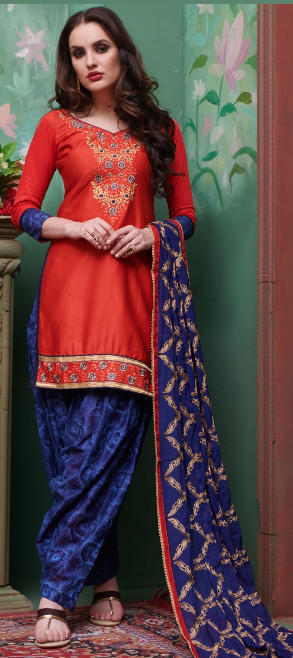 1501358: Orange color Salwar Kameez