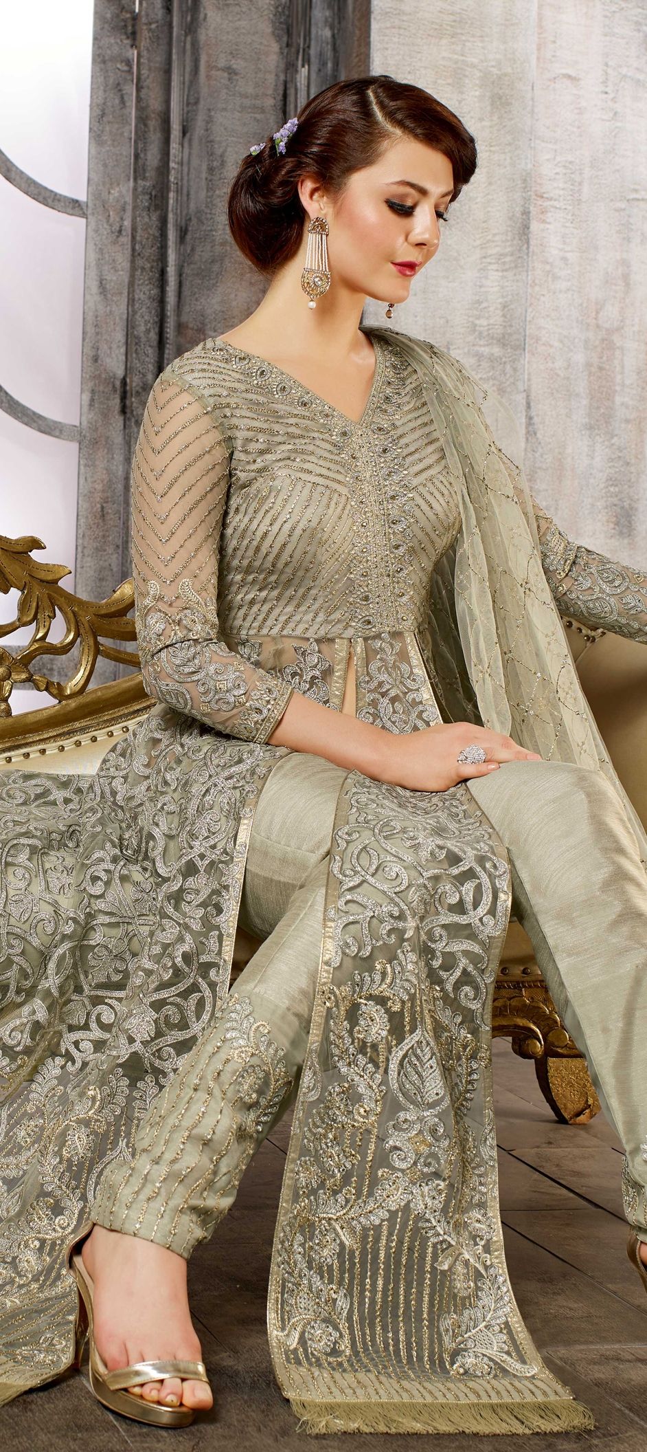 1515935: Mehendi Sangeet Green color Net fabric Salwar Kameez
