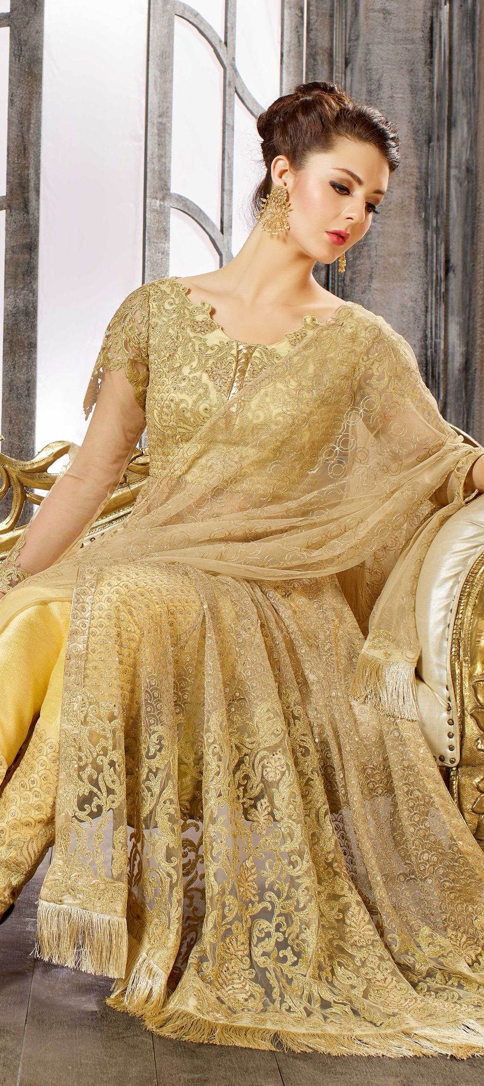 1515944: Mehendi Sangeet Gold color Net fabric Salwar Kameez
