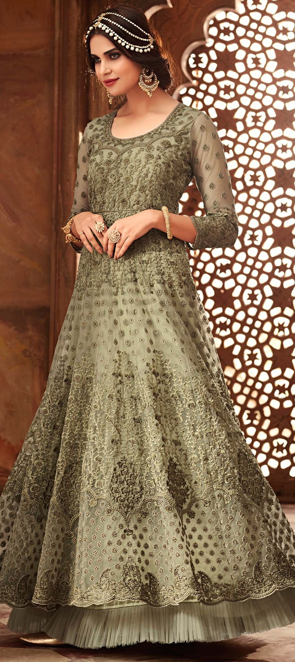 1554980: Party Wear Green color Net fabric Salwar Kameez