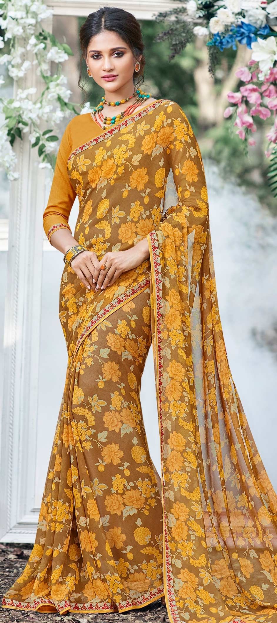 1563695: Casual Gold color Georgette fabric Saree