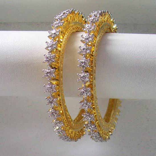 300516: Gold Rodium Polish Bangles in Metal Alloy studded with CZ Diamond.