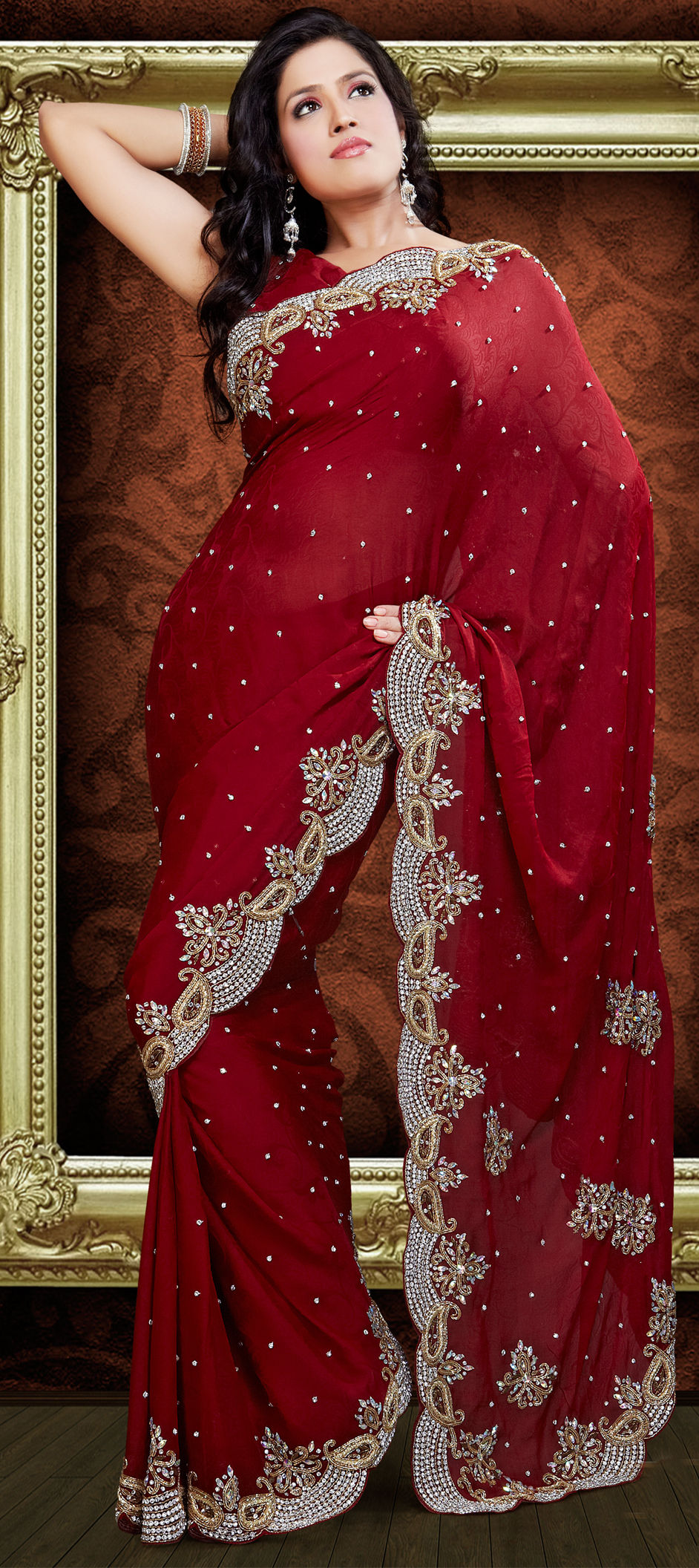 76375: Red and Maroon color family Saree with matching unstitched blouse.