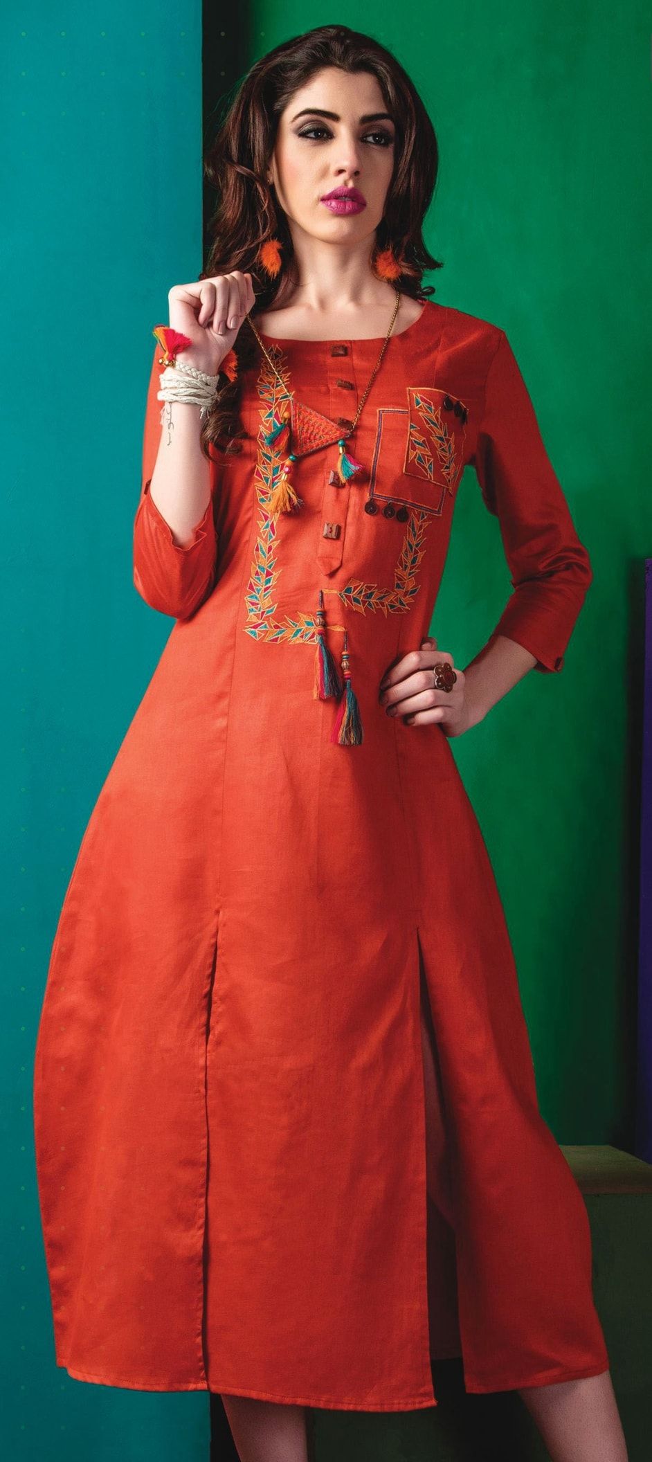 905995: Orange color family stitched Cotton Kurtis