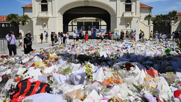 Australia Mourns Bondi Beach Shooting Victims with Silence and Reflection | World | Pulsewire ...