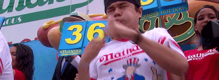 The Hot Dog Eating Contest: A Tale as Tall as 73 Hot Dogs | Nathans