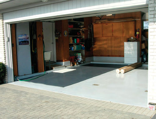 Rolling Out a New Garage Floor - AutoRestorer