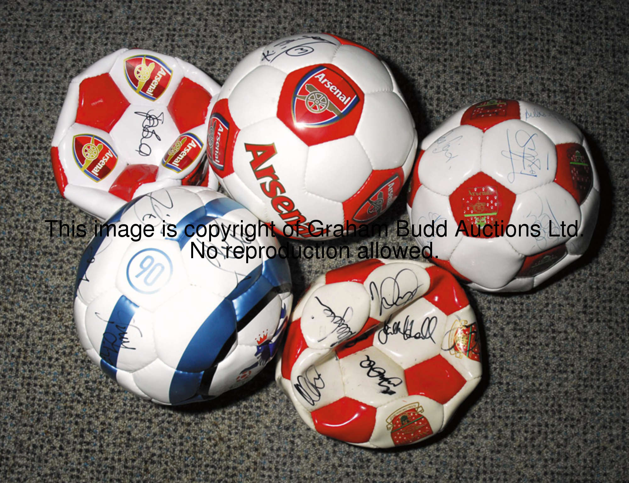 A collection of five signed Arsenal footballs, i) a squad-signed Nigel ...